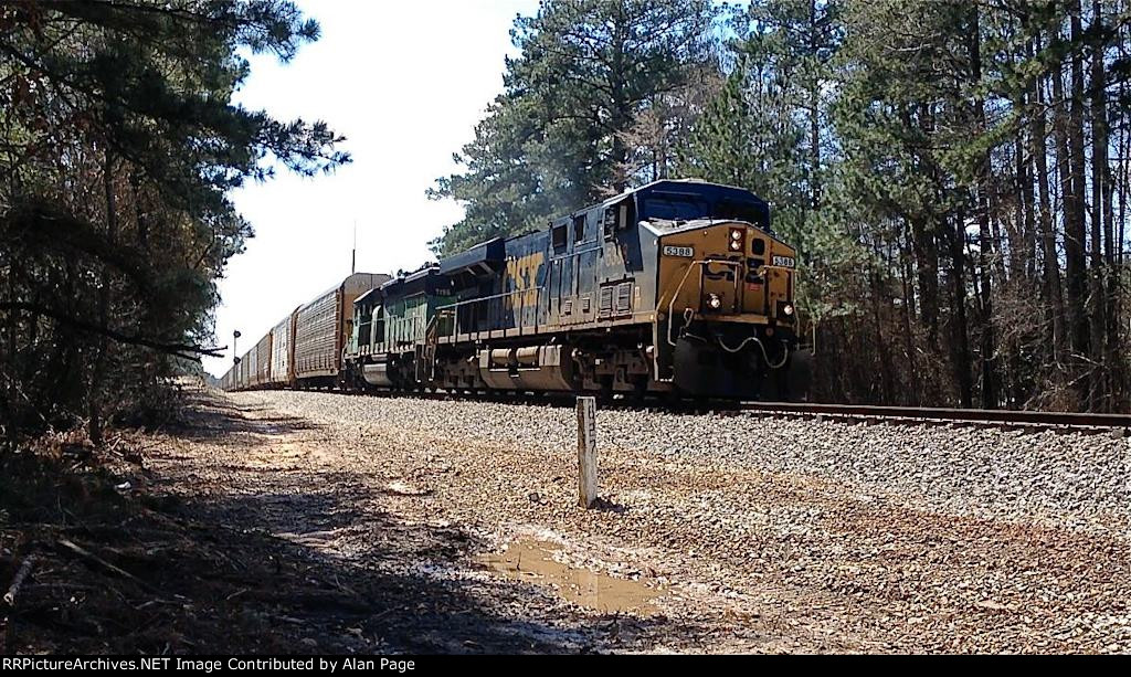 CSX ES40DC 5388 and HLCX SD40-2 7196 pass mile 827